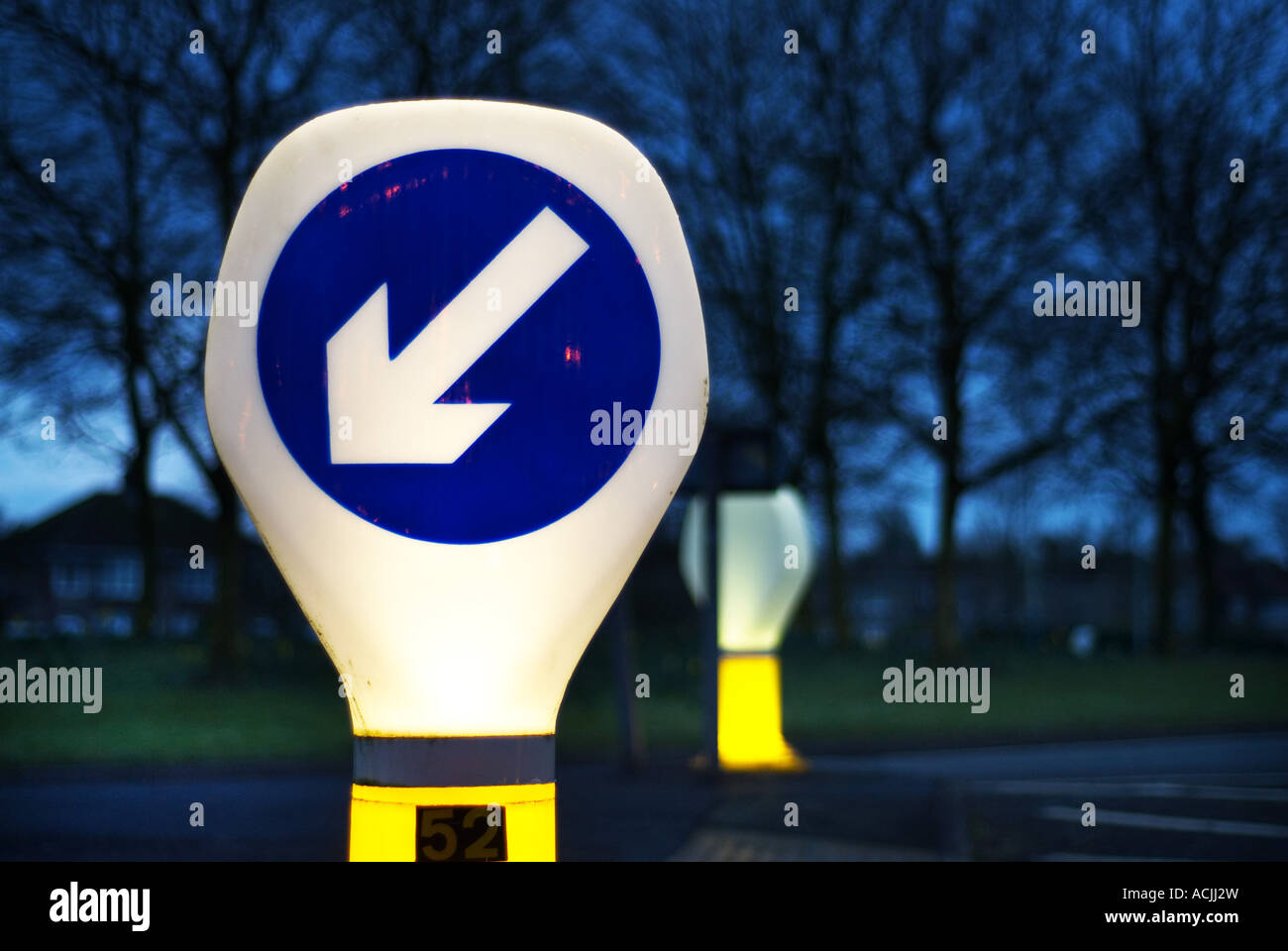 illuminated keep left sign Stock Photo - Alamy