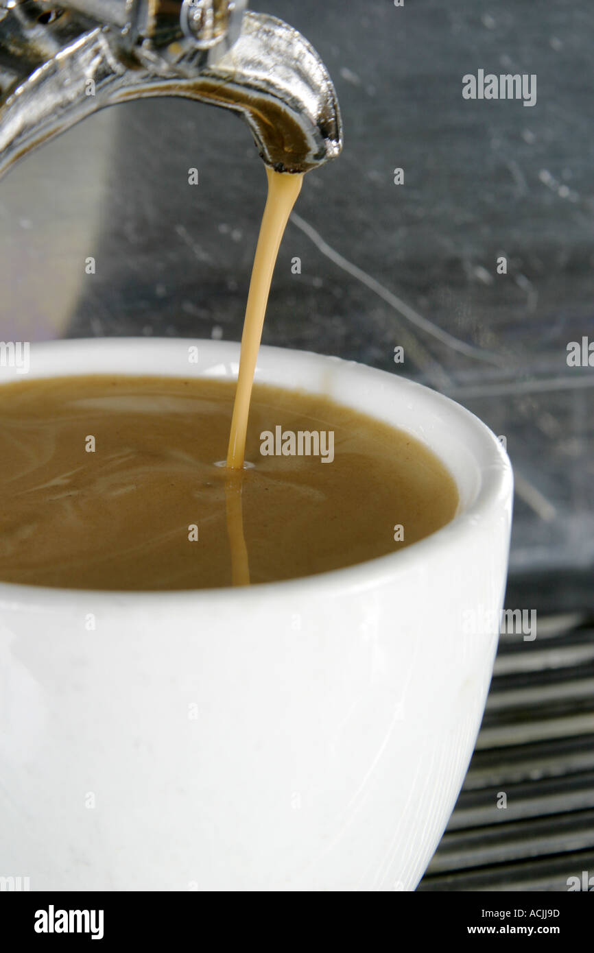 Double Americano being drawn from a professional espresso machine Stock ...