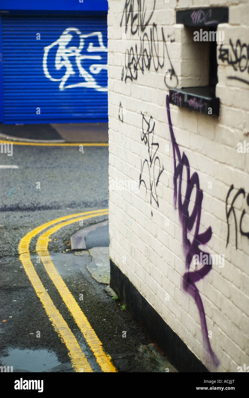 swindon street scene with graffiti and yellow lines Stock Photo - Alamy