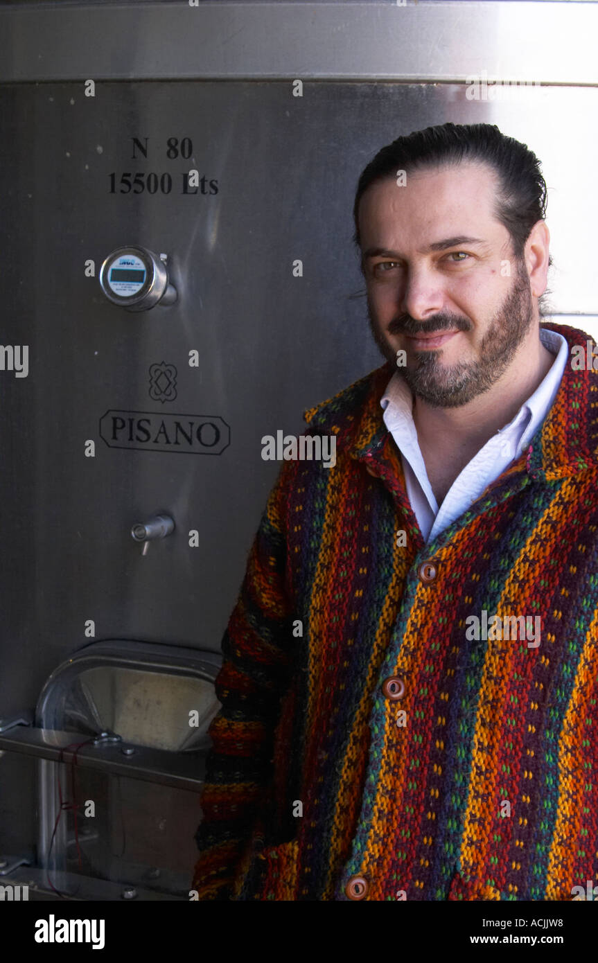 Gustavo Pisano one of the brothers Pisano in the modern wine cellar in ...