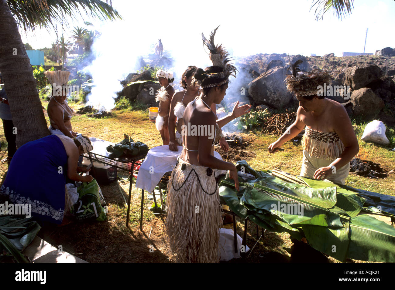 Natives preparing traditional food Easter Island during Tapati Festival ...