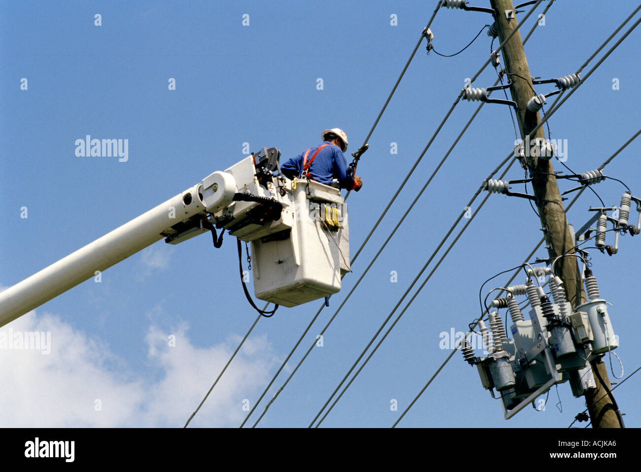 Lineman repairing hurricane damage in Florida in 2004 Stock Photo - Alamy