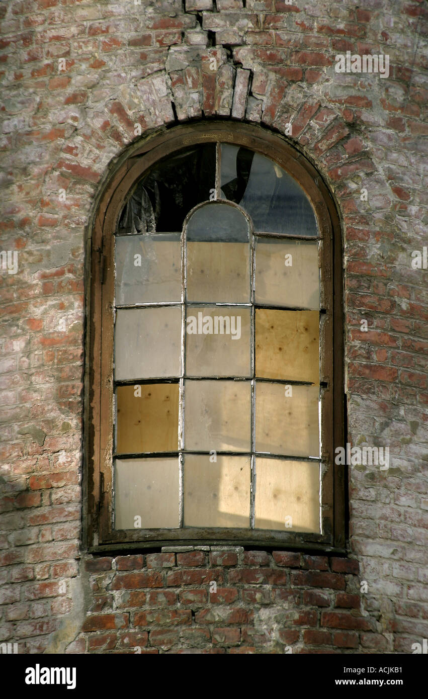 An old glass window in a retro brick building Stock Photo - Alamy