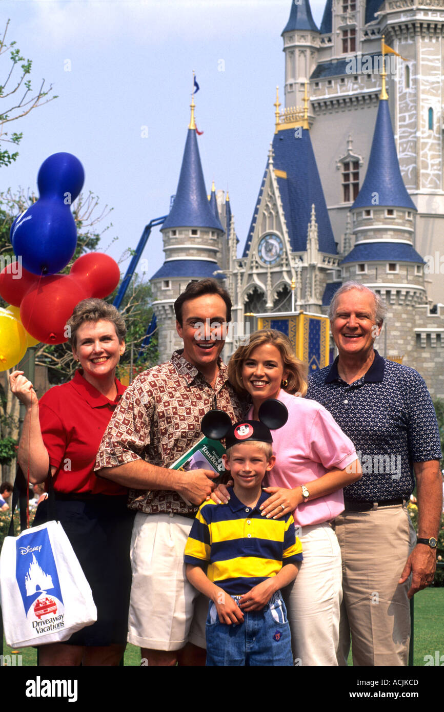 Family of three generations at Cinderellas Castle at Disney World in ...