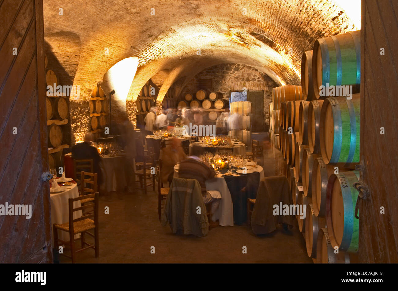 The underground vaulted barrel aging room set up for ceremonial dinner ...