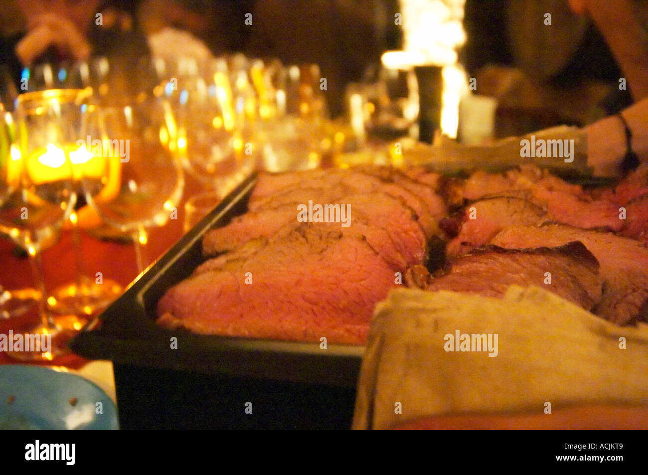 A large plate of traditional charcoal grilled beef being served at the ...