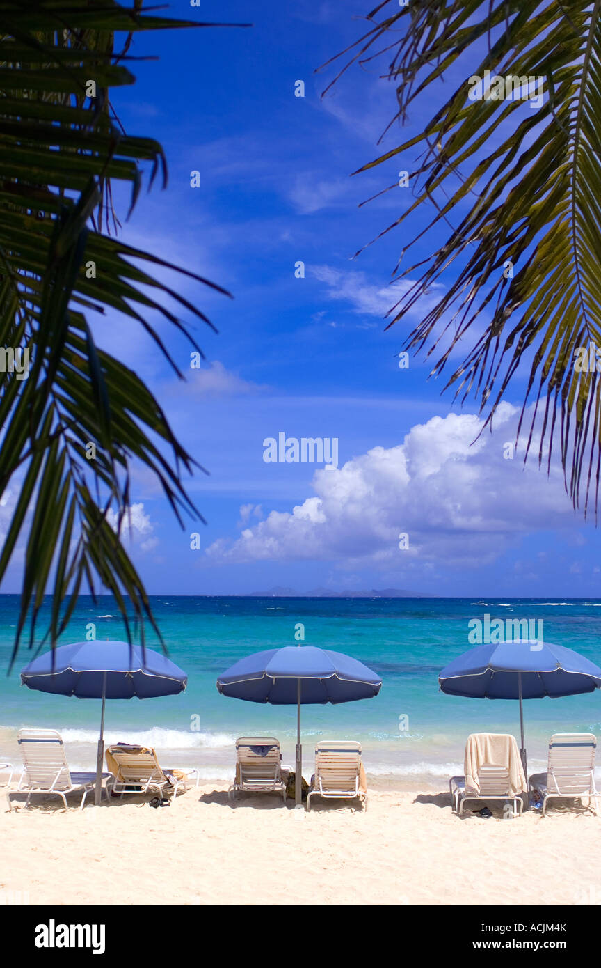 Umbrellas on Dawn Beach St Maarten st martin Caribbean Stock Photo - Alamy