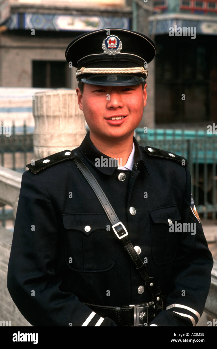 Policeman in uniform in Beijing China Stock Photo - Alamy