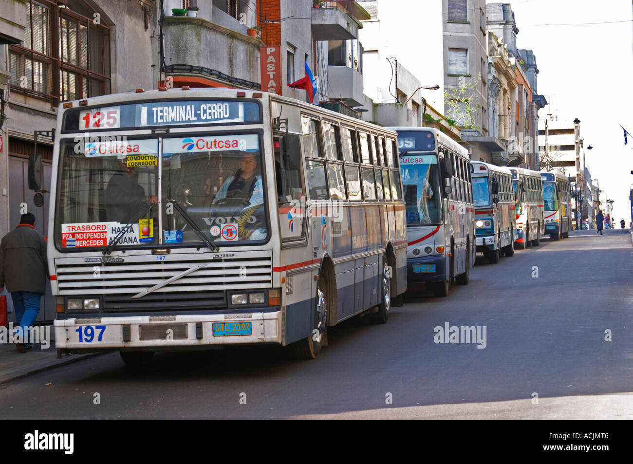 A row of buses on a city street. Montevideo, Uruguay, South America ...