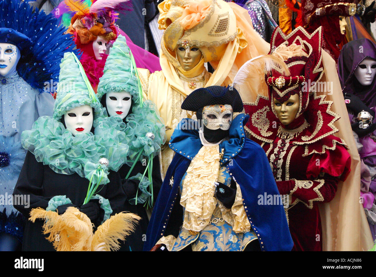 Group of masked costume characters Venice Carnival Stock Photo - Alamy