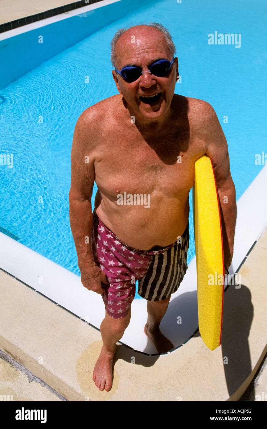 Healthy retired senior having fun at the pool Stock Photo - Alamy