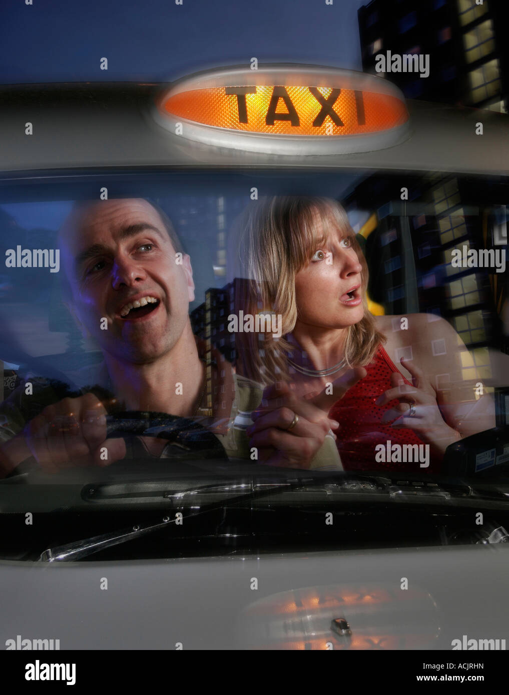 Cab driver points location to woman passenger Stock Photo - Alamy