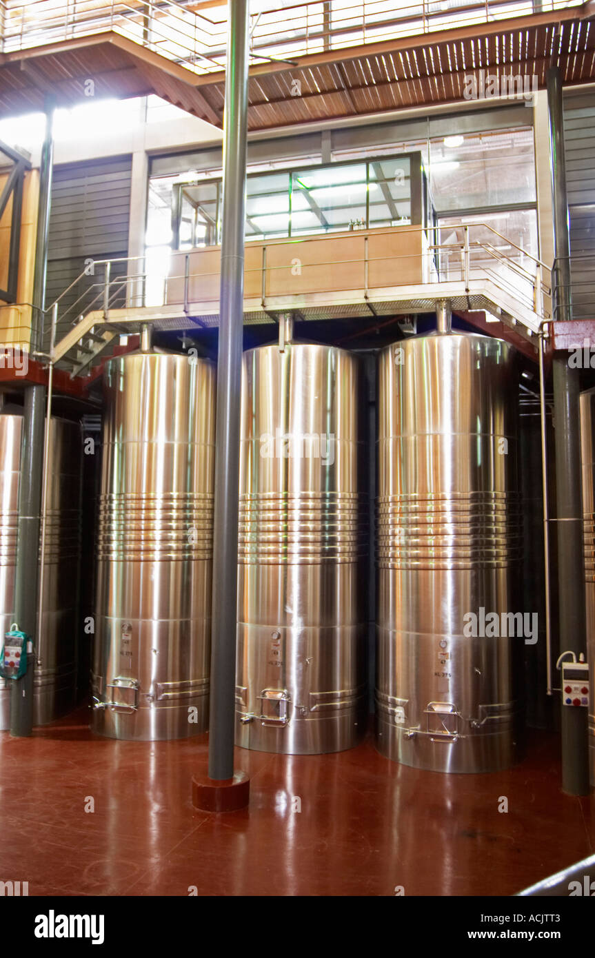 The winery with many big stainless steel fermentation tanks. Bodega ...