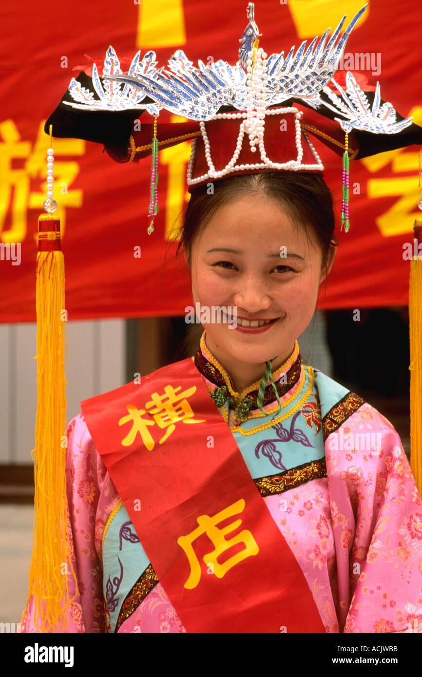 Colorful portrait of beautiful woman in traditional costume in Shanghai ...