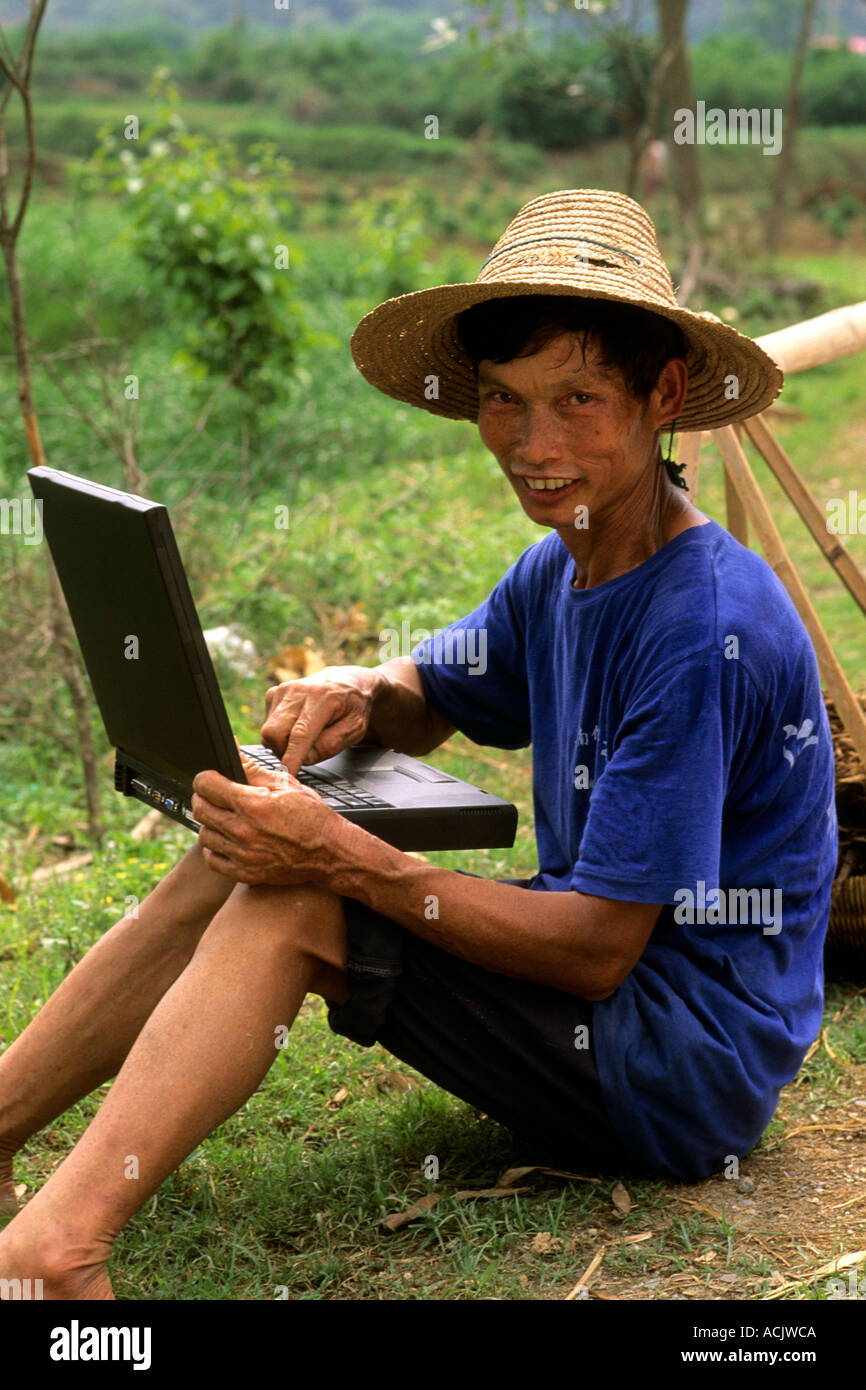 Chinese farmer with laptop hi-res stock photography and images - Alamy