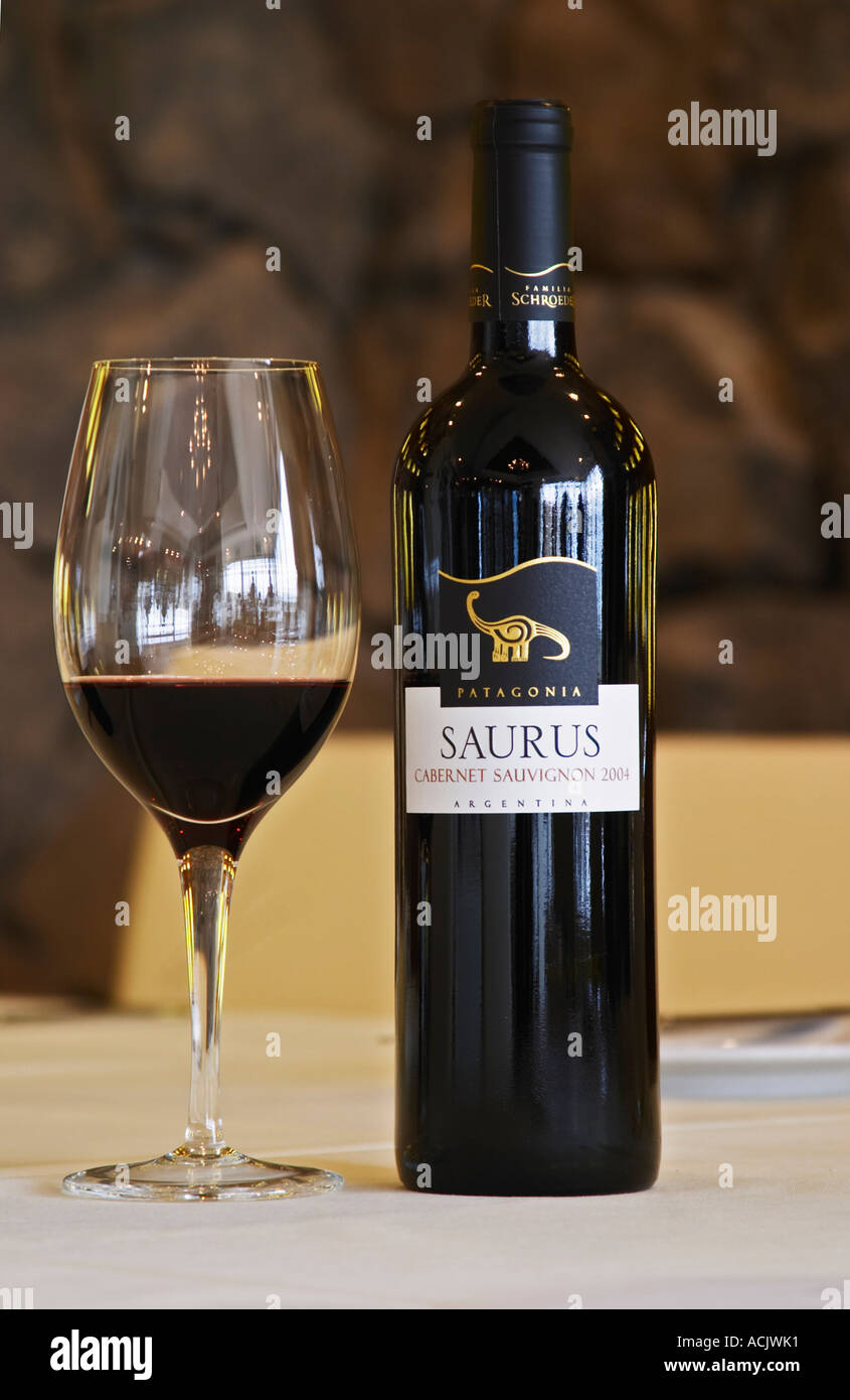 Bottle and glass of Saurus Patagonia Cabernet Sauvignon Bodega Familia ...