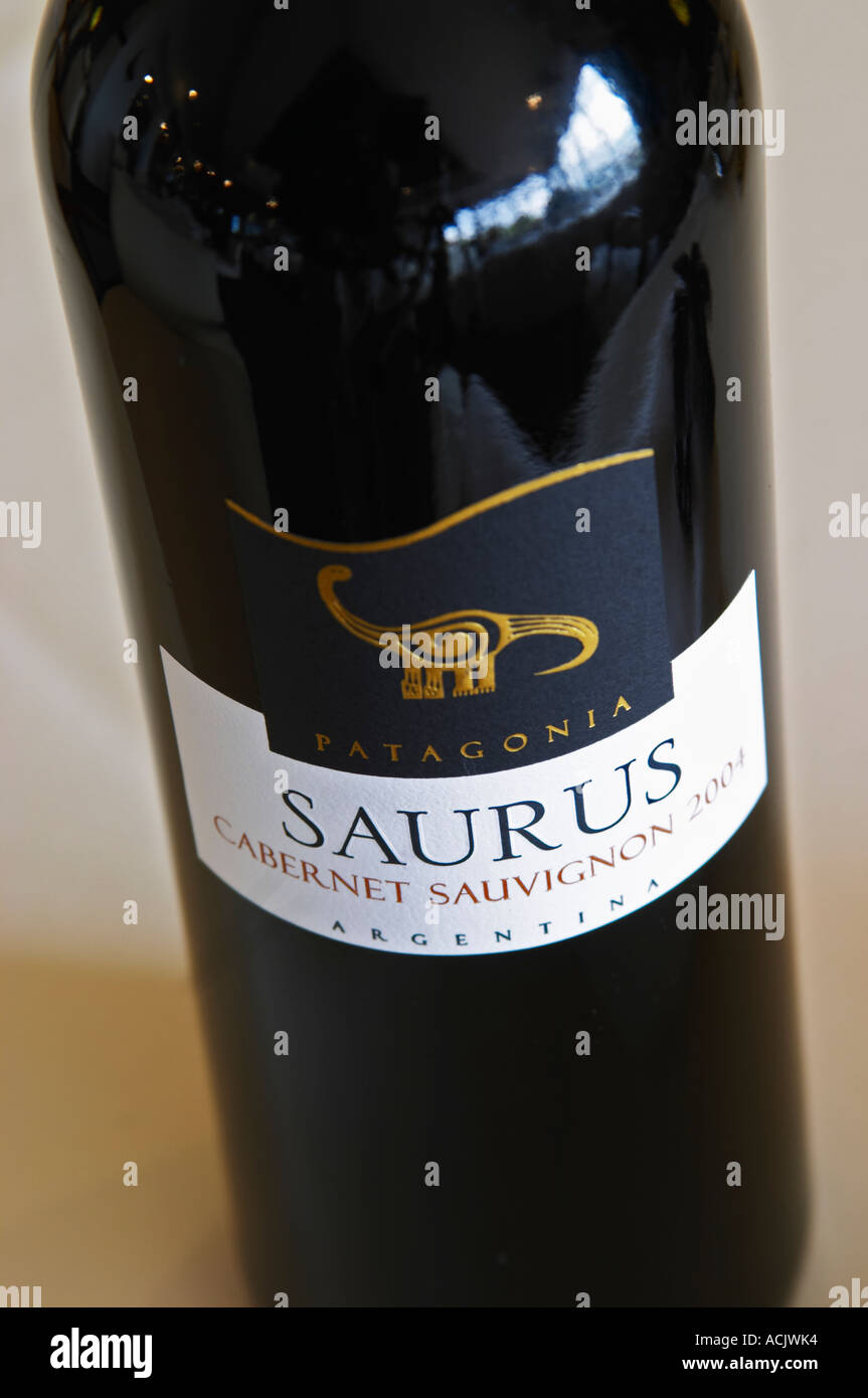 Bottle and glass of Saurus Patagonia Cabernet Sauvignon Bodega Familia ...