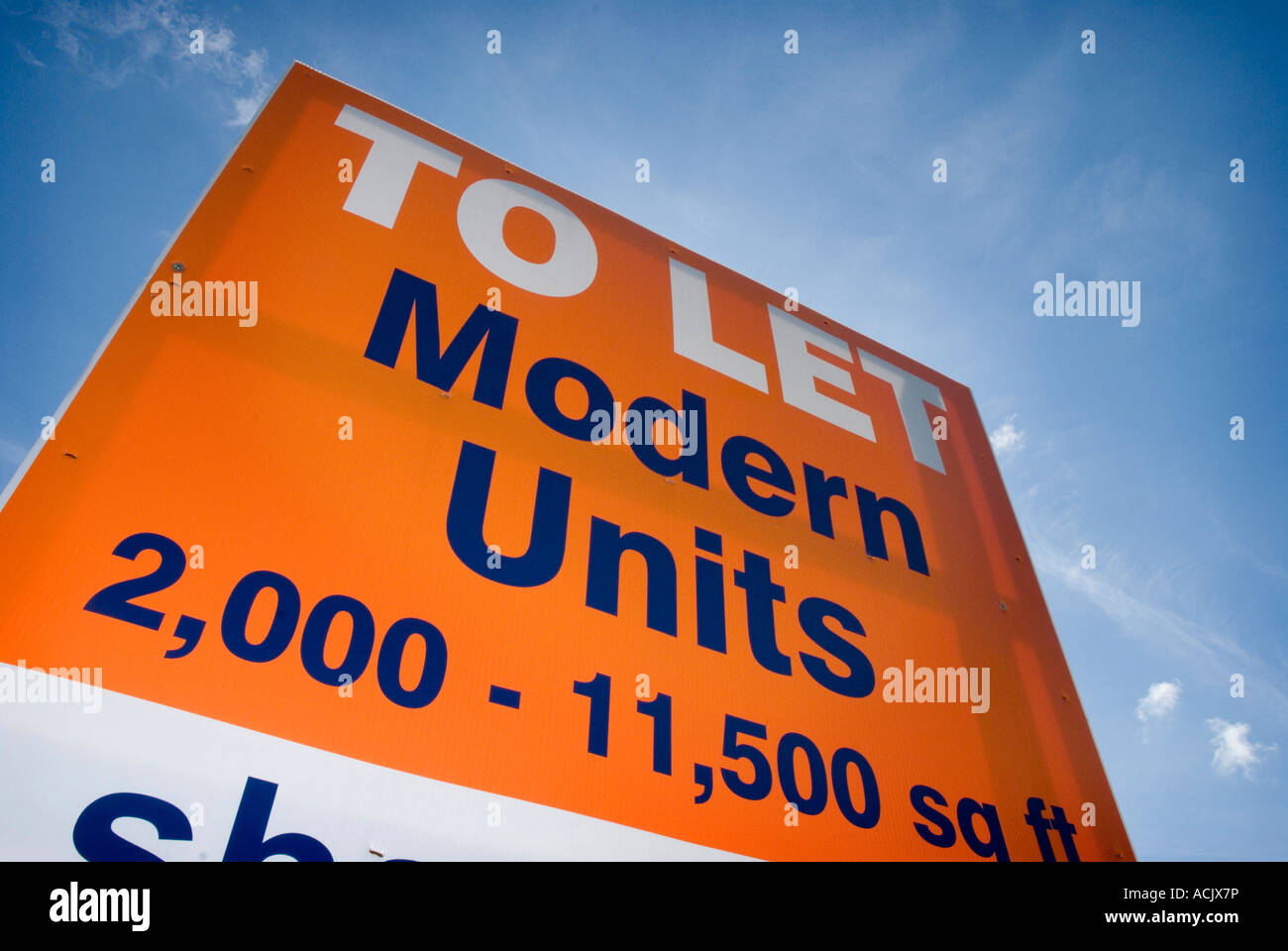 To let sign outside an industrial estate Stock Photo - Alamy