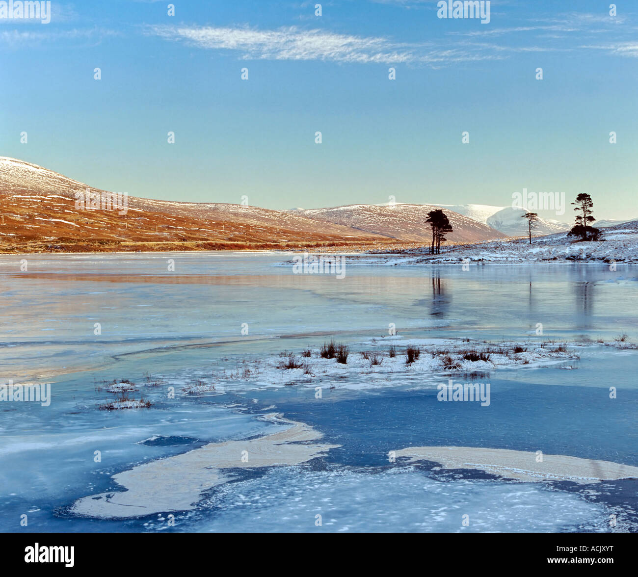Deep frozen Loch Droma on a crisp cold morning off the A835 Strathglass ...