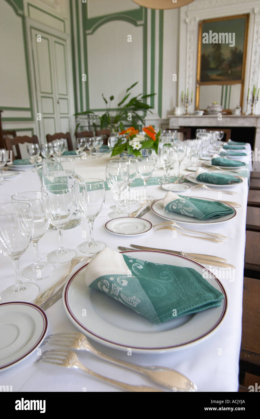 The magnificent lunch table set in traditional style with starched ...