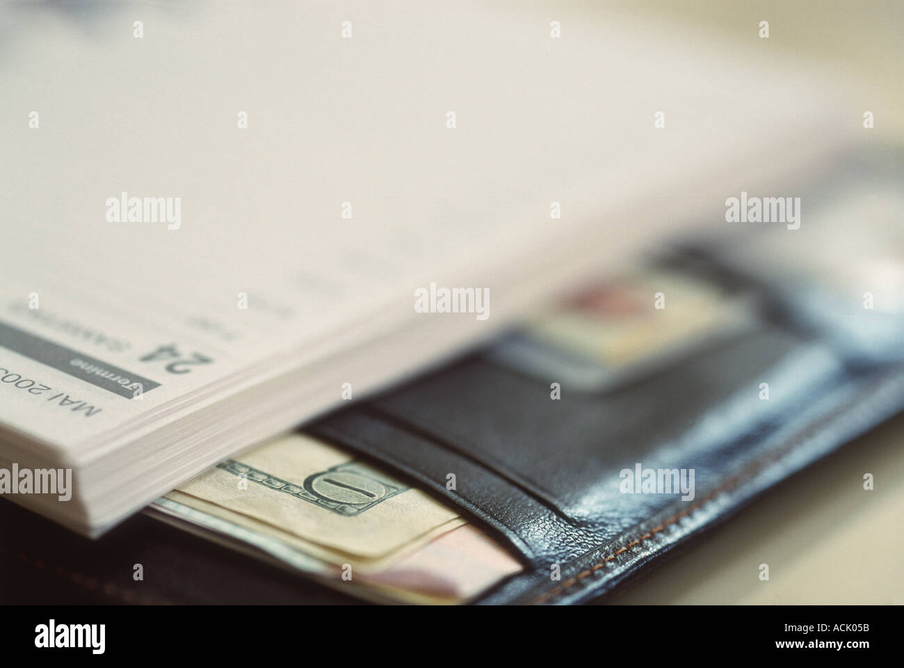 A calendar with money Stock Photo - Alamy