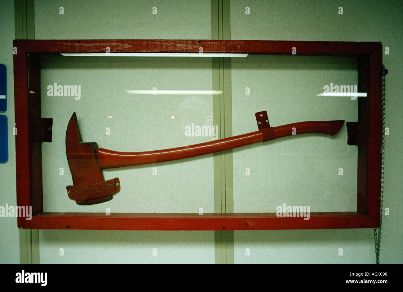 A fire axe in a glass case Stock Photo - Alamy