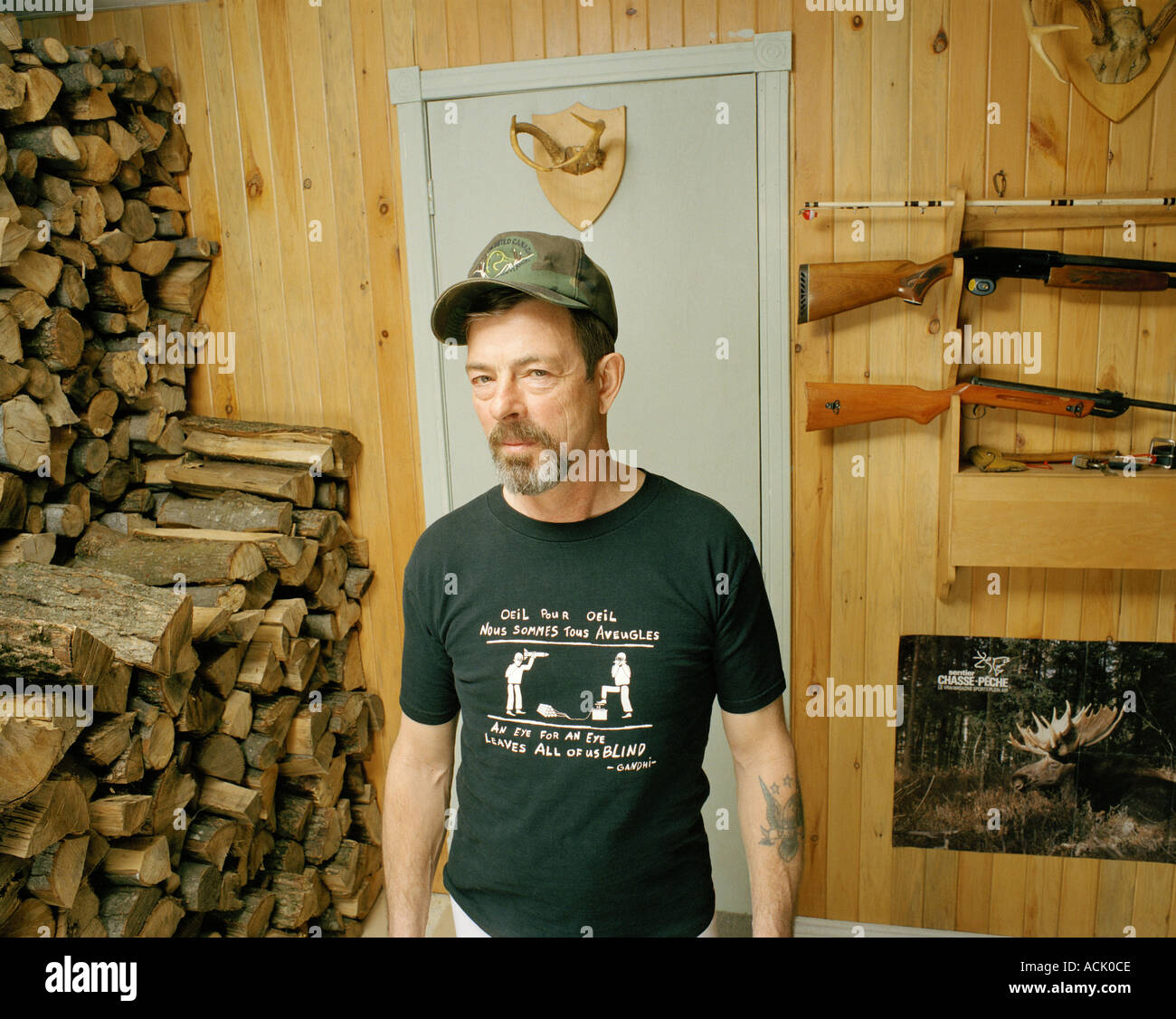 A hunter standing in a cabin Stock Photo - Alamy