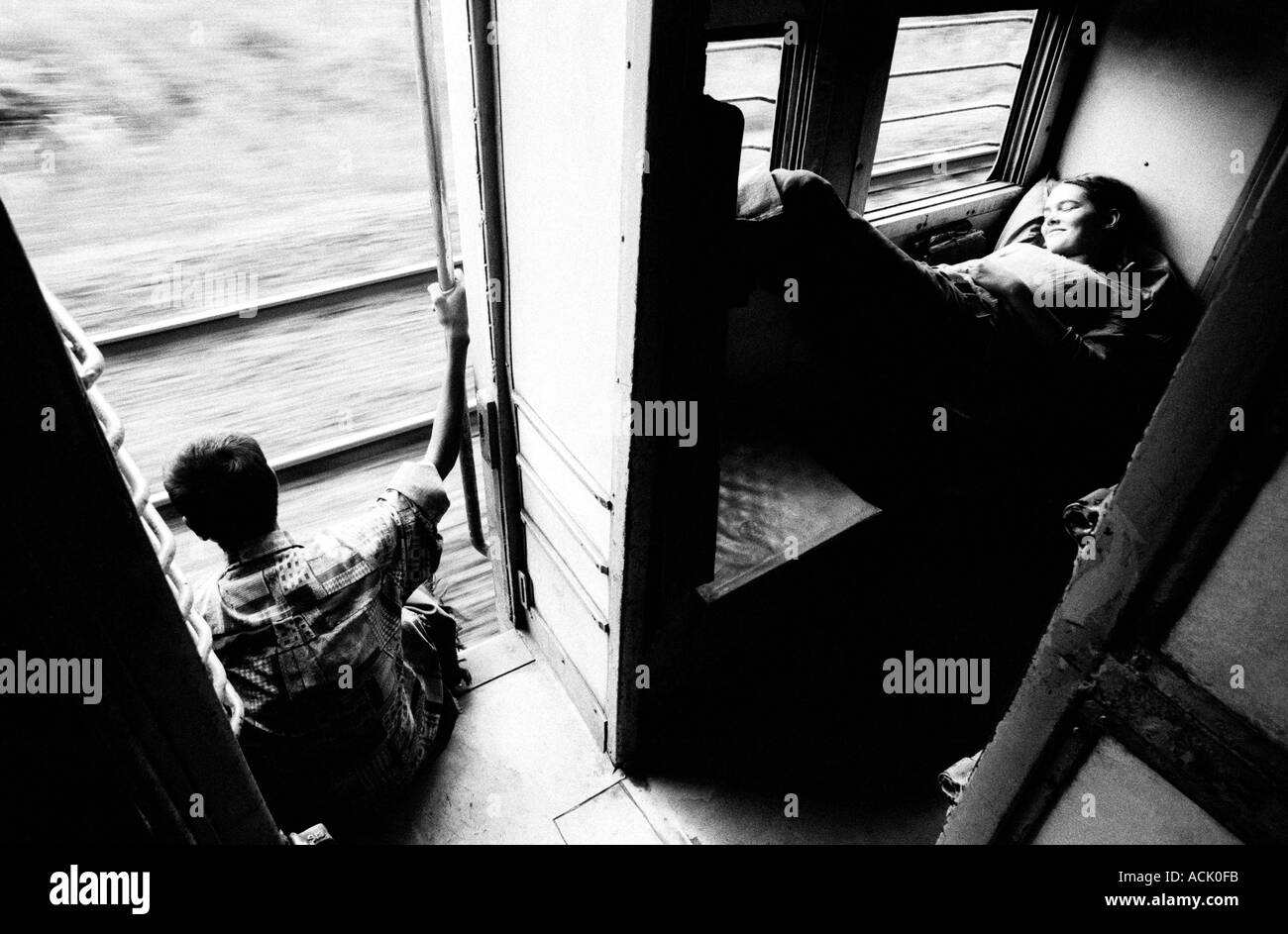 Riding a train Black and White Stock Photos & Images - Alamy