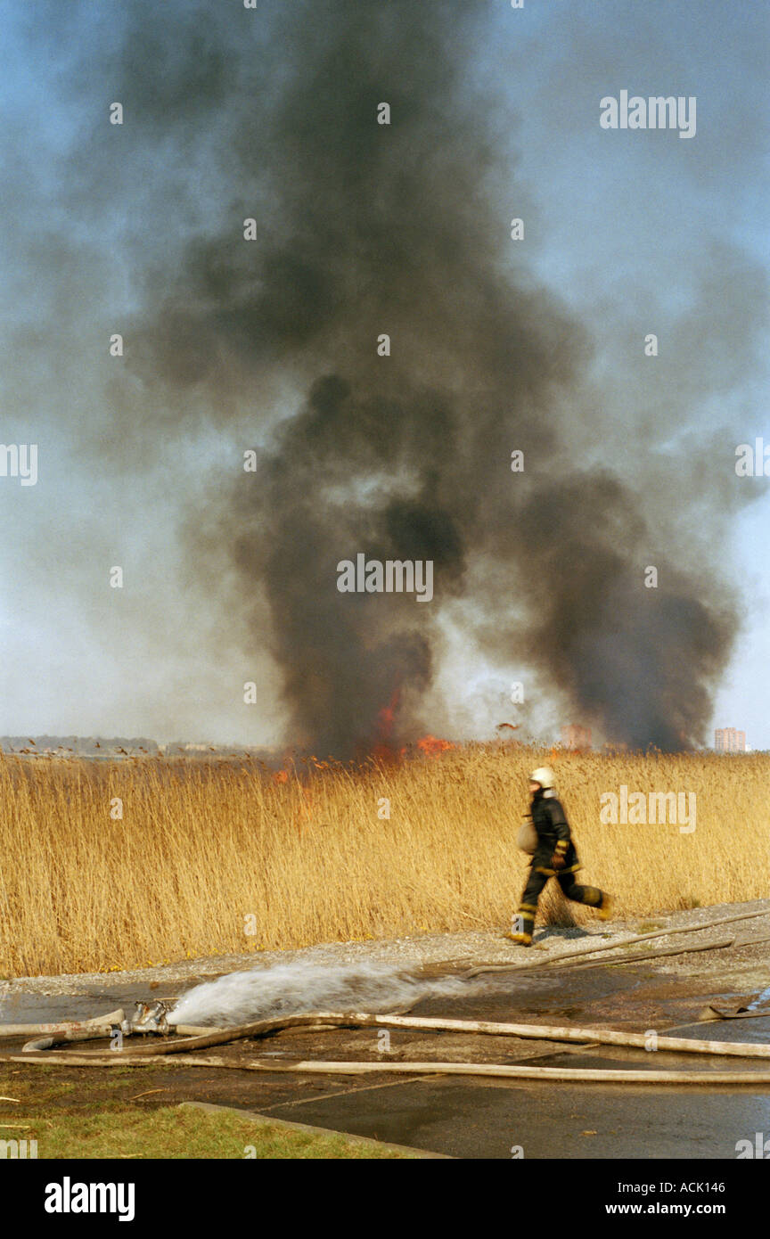 Running from fire hi-res stock photography and images - Alamy