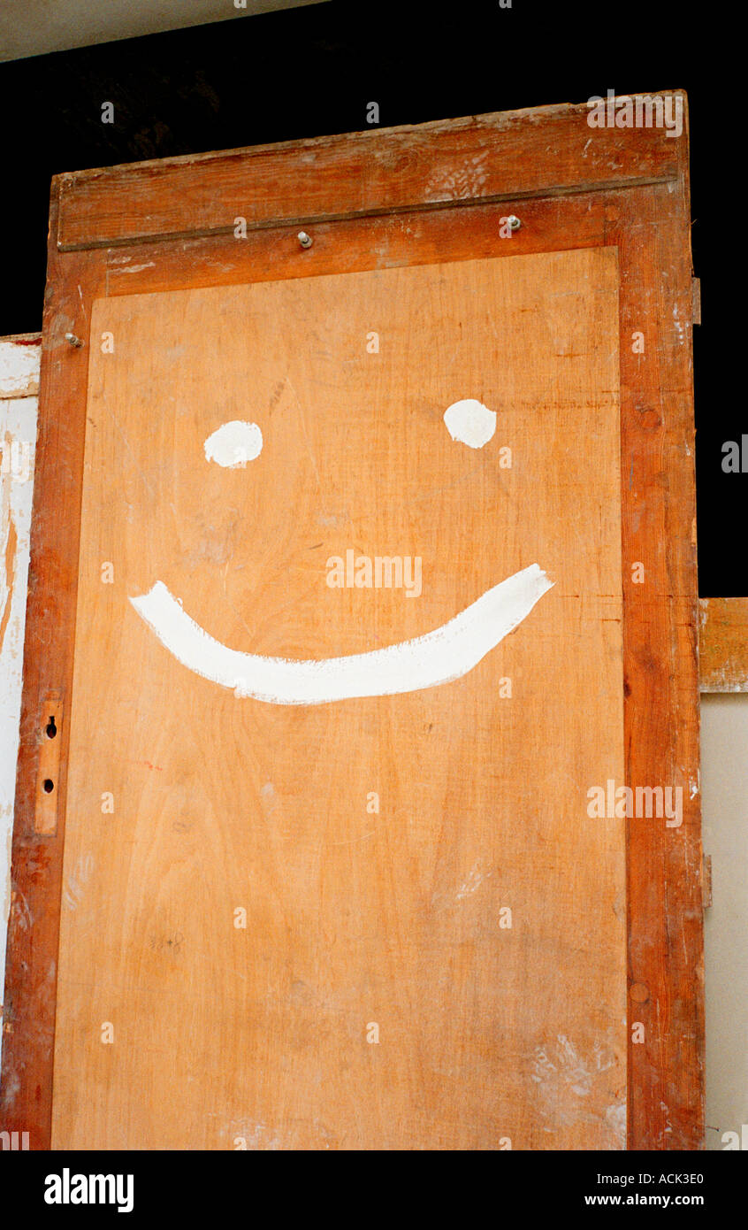 door painted with a smiley face Stock Photo - Alamy