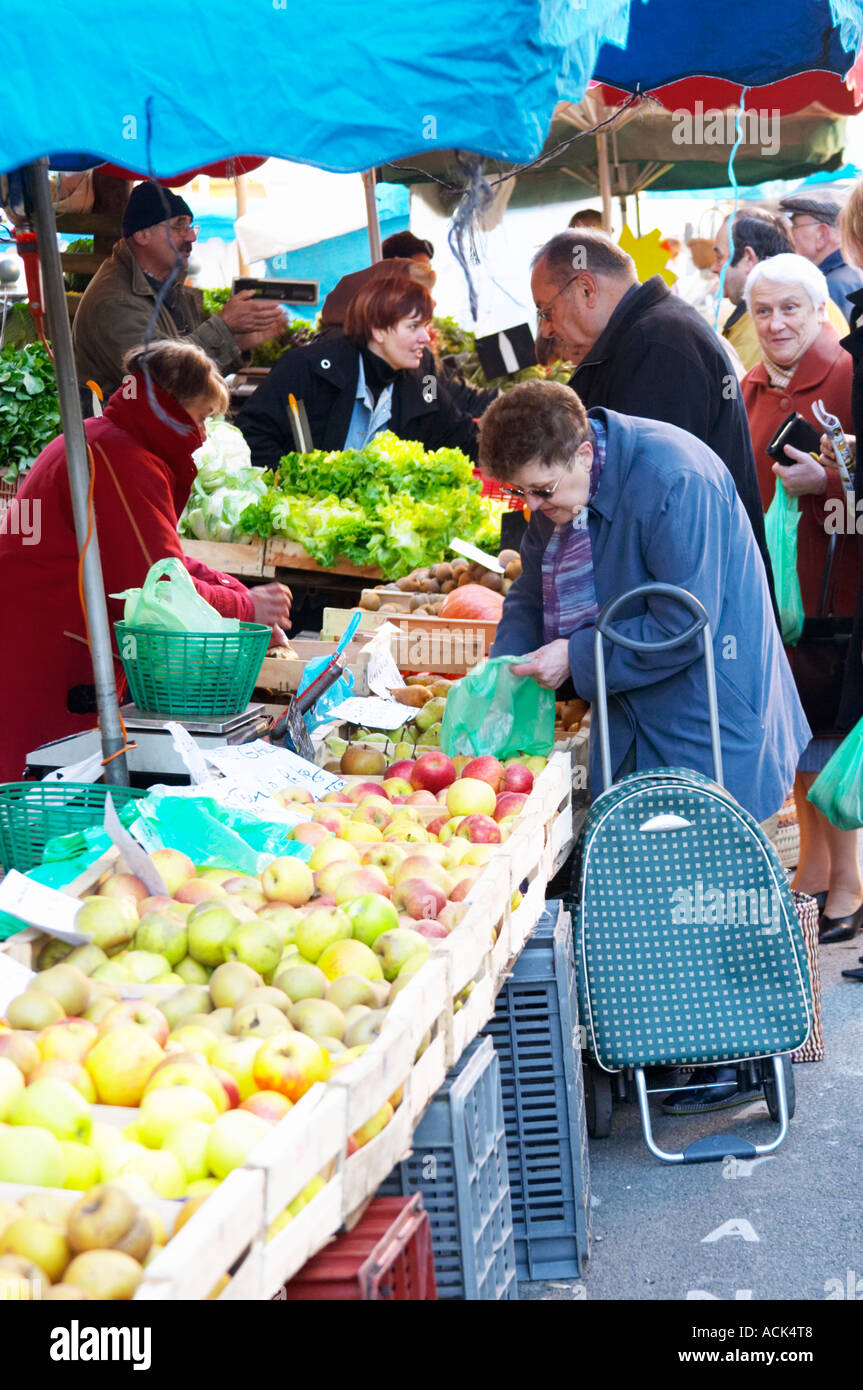 Woman buying vegetables in marketplace hi-res stock photography and ...