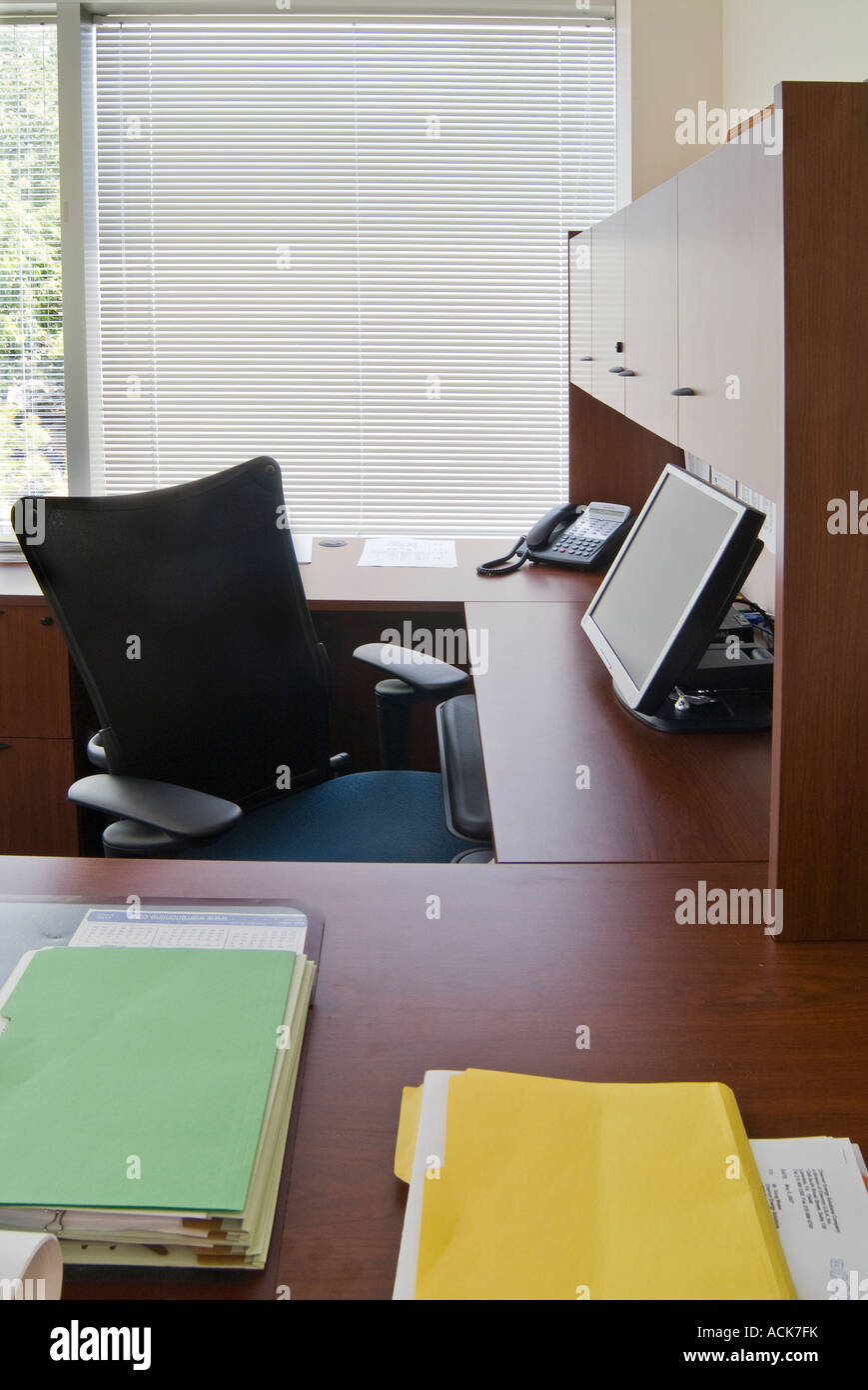 Neat Office Desk With Chair Window Blinds Flat Screen Computer Monitor ...