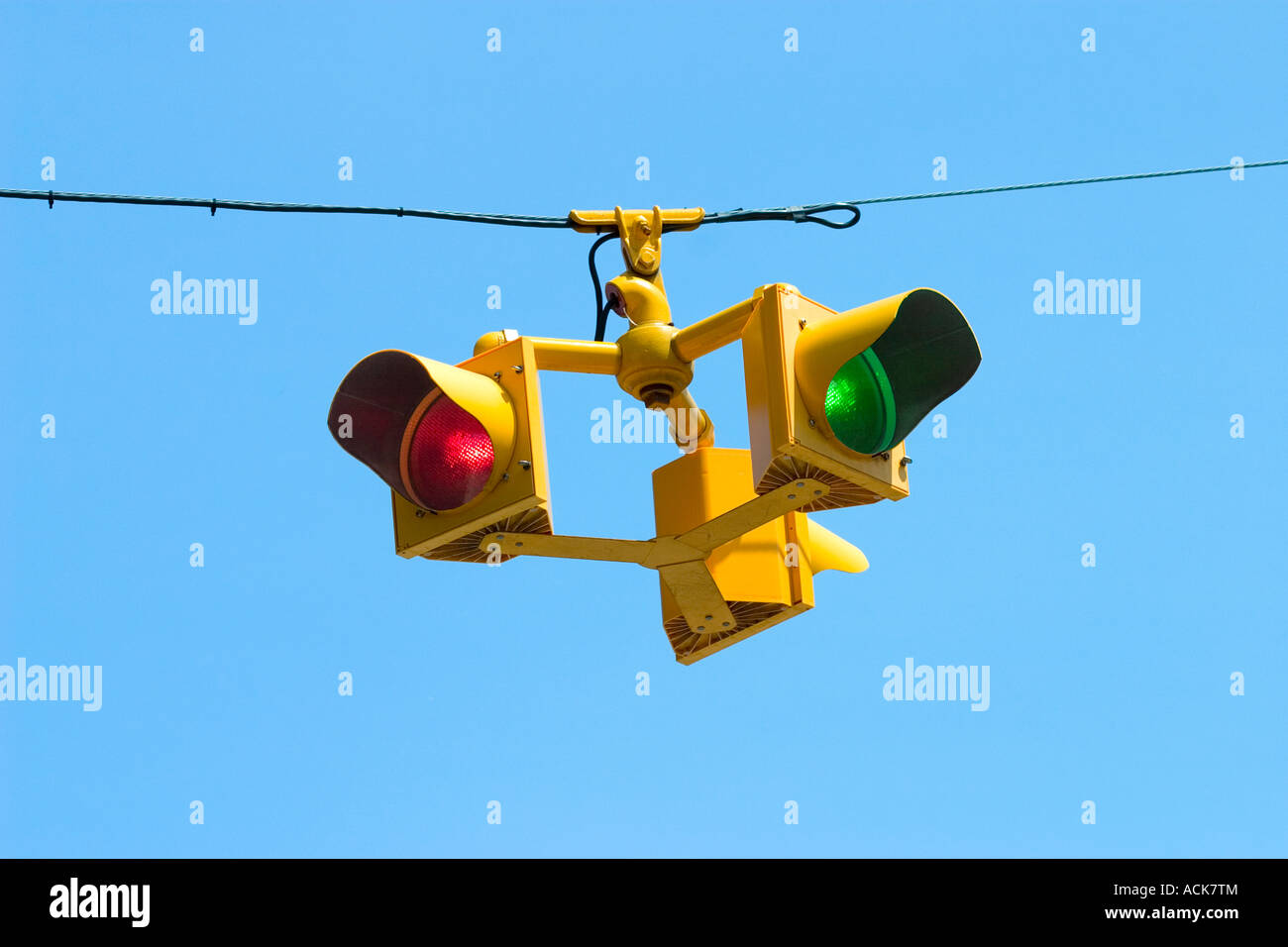 Three-direction traffic light signal with one green light and one red ...