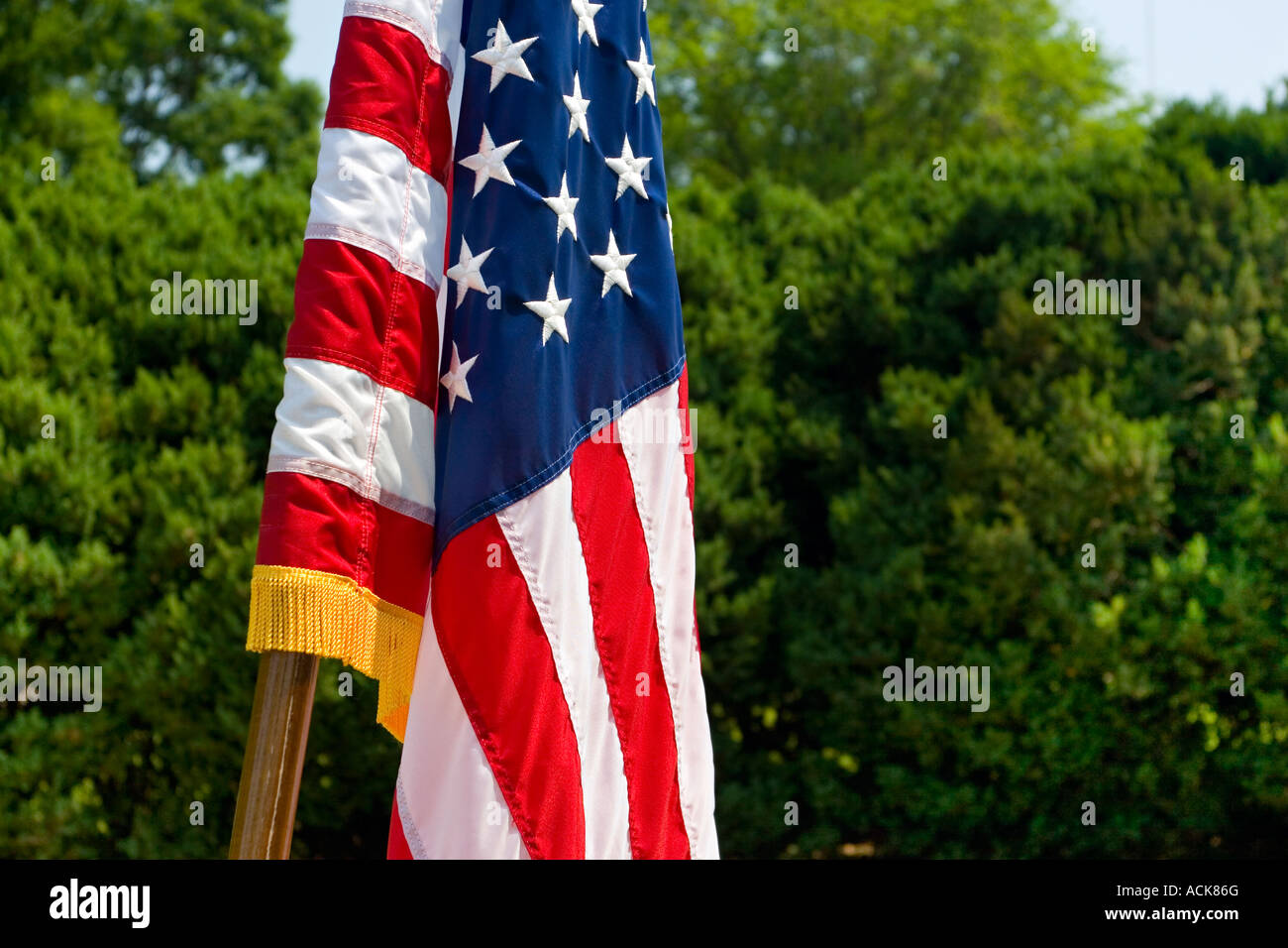 Close-up detail of American flag with gold trim Stock Photo - Alamy