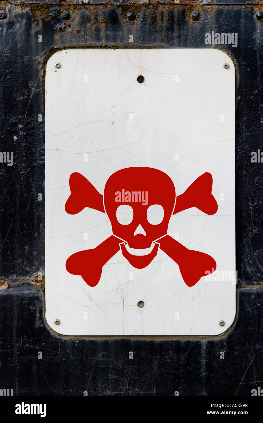 Skull and crossbones danger symbol sign Stock Photo - Alamy