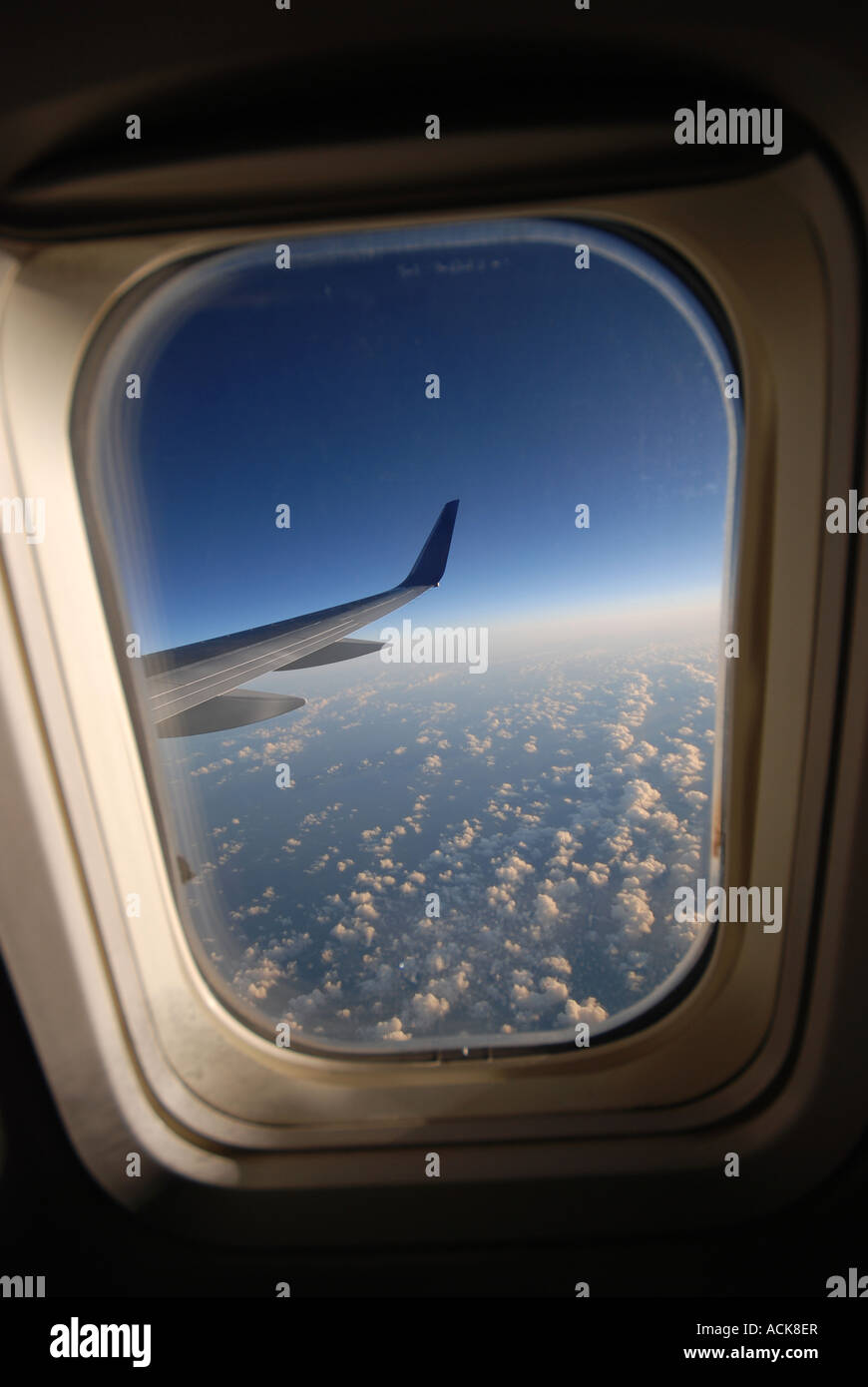look out window view plane flight sky vertical Stock Photo - Alamy