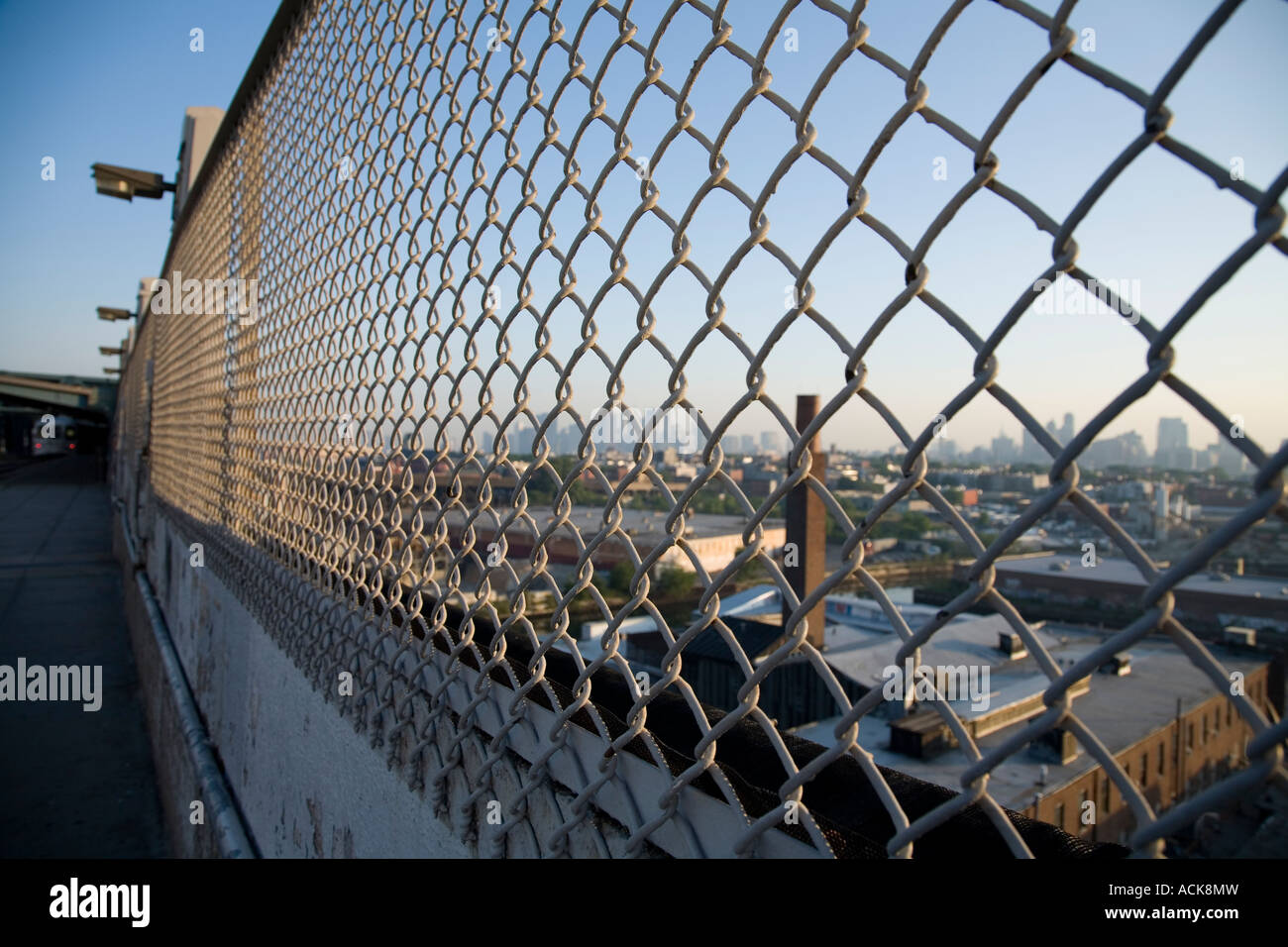 Warehouses Seen Through Fence Stock Photo - Alamy