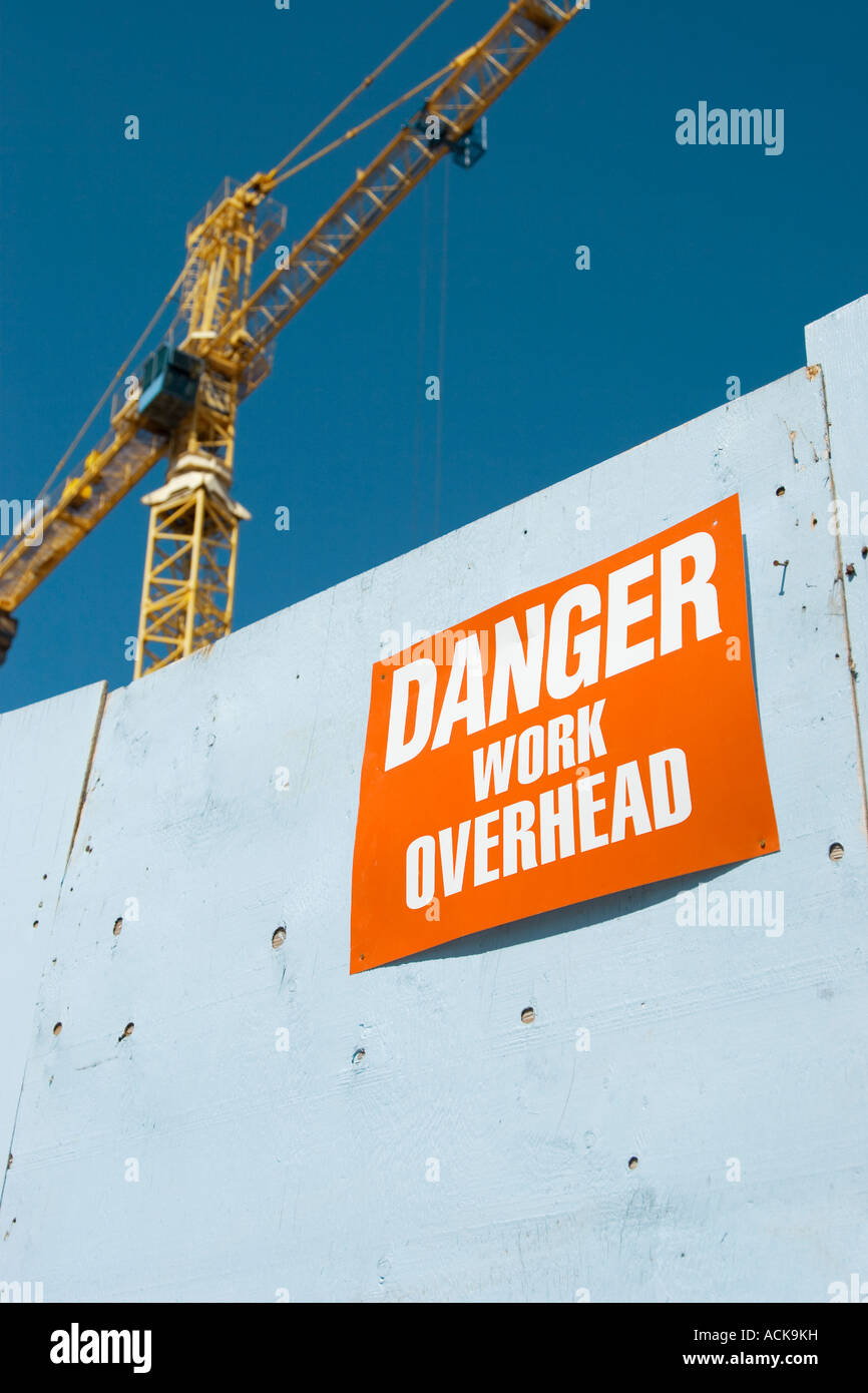 Danger - Work Overhead sign at construction site Stock Photo - Alamy