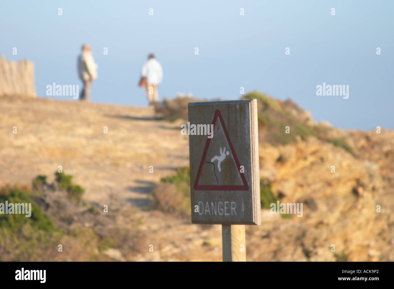 Risk of falling off cliff edge hi-res stock photography and images - Alamy