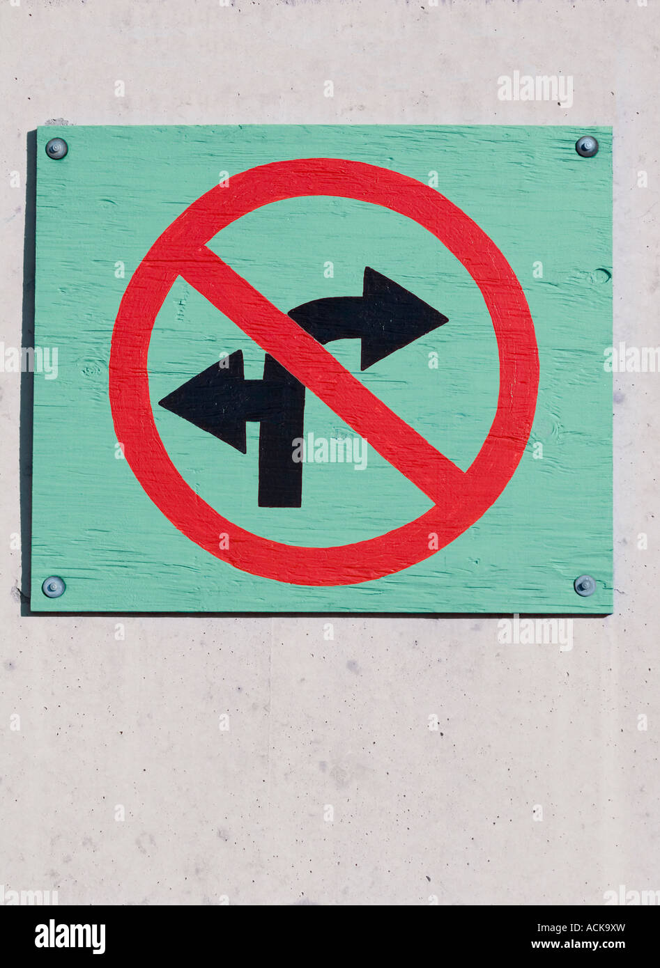 Wooden no left turn or right turn ahead sign Stock Photo - Alamy