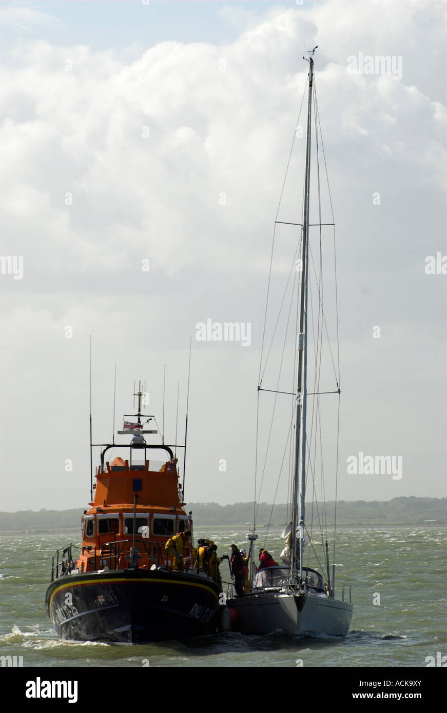 The Yarmouth based RNLI lifeboat helps a stricken yacht in the Solent ...