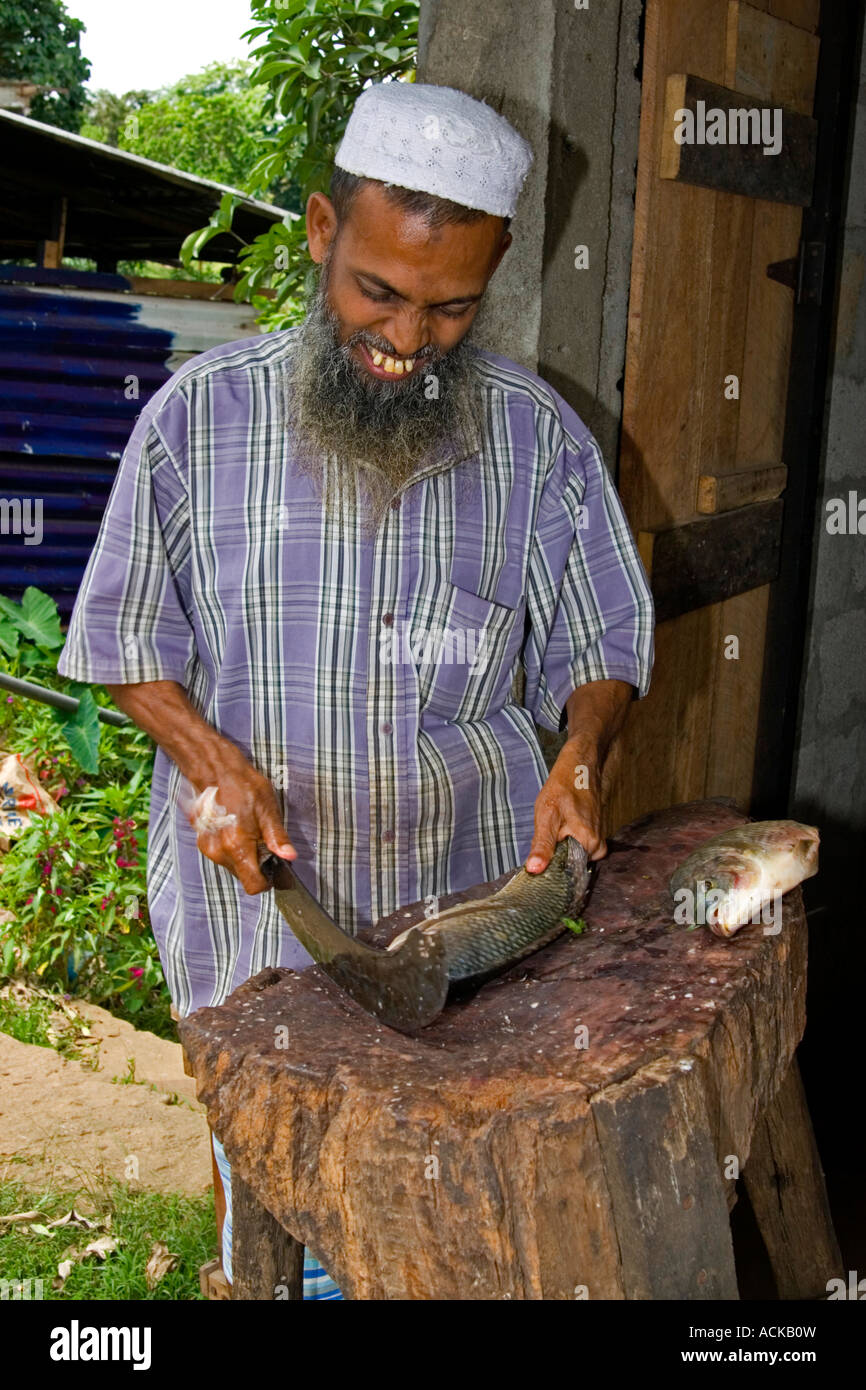 Muslim fish monger Stock Photo - Alamy