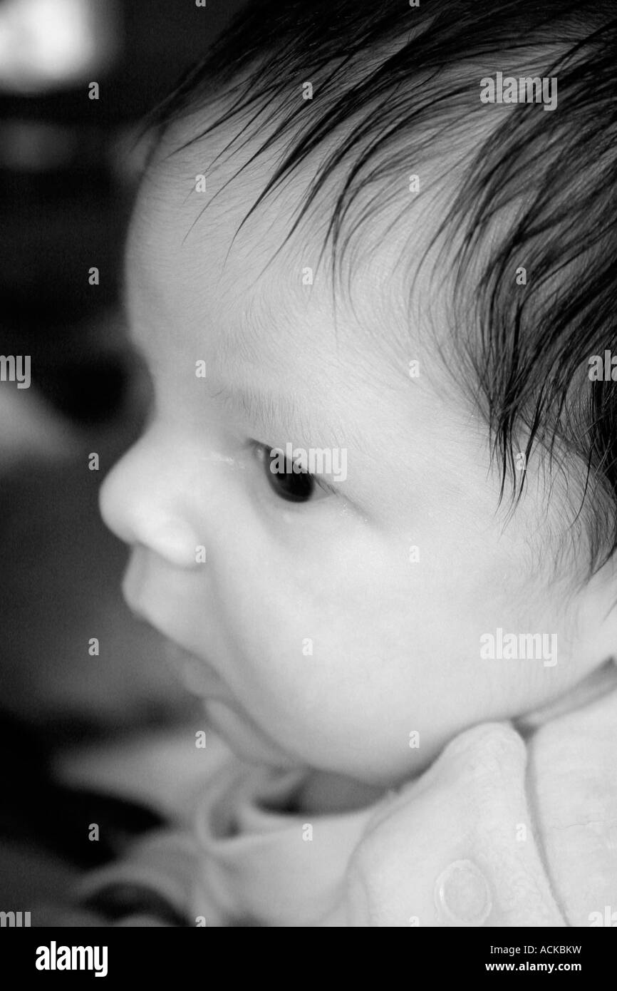 2 week old baby boy gazing Stock Photo - Alamy