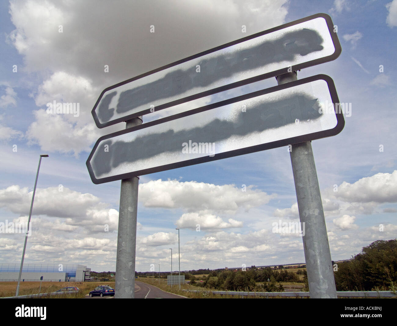 Blank sign post at the side of a new road construction Stock Photo - Alamy