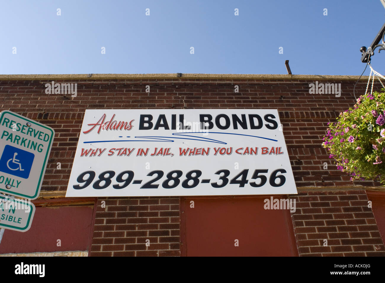 Building with sign reading Adams Bail Bonds Why stay in jail when you ...