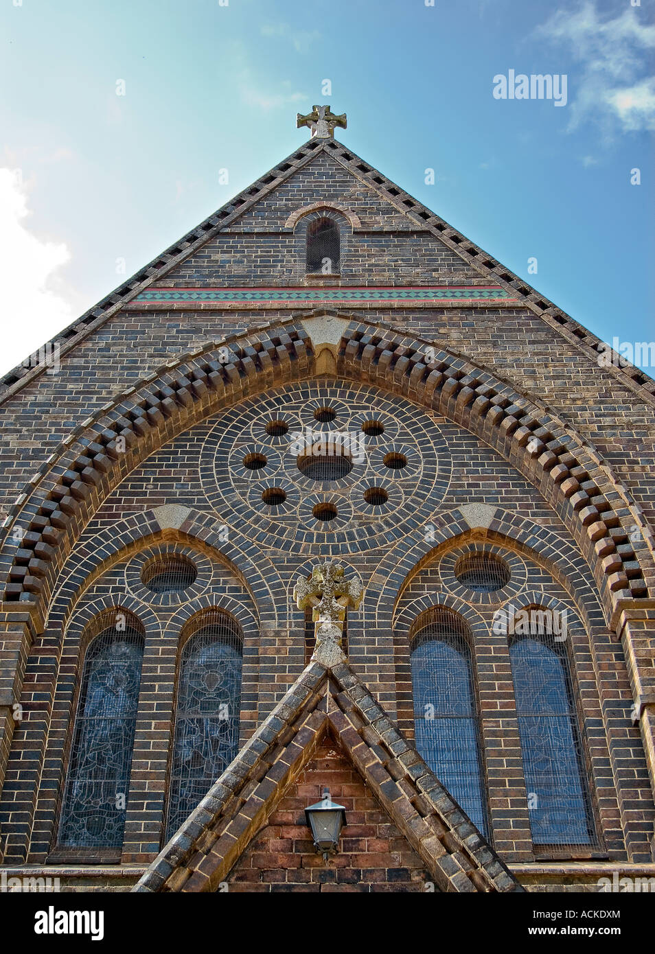 the upper part of the church with decorative brickwork windows and ...