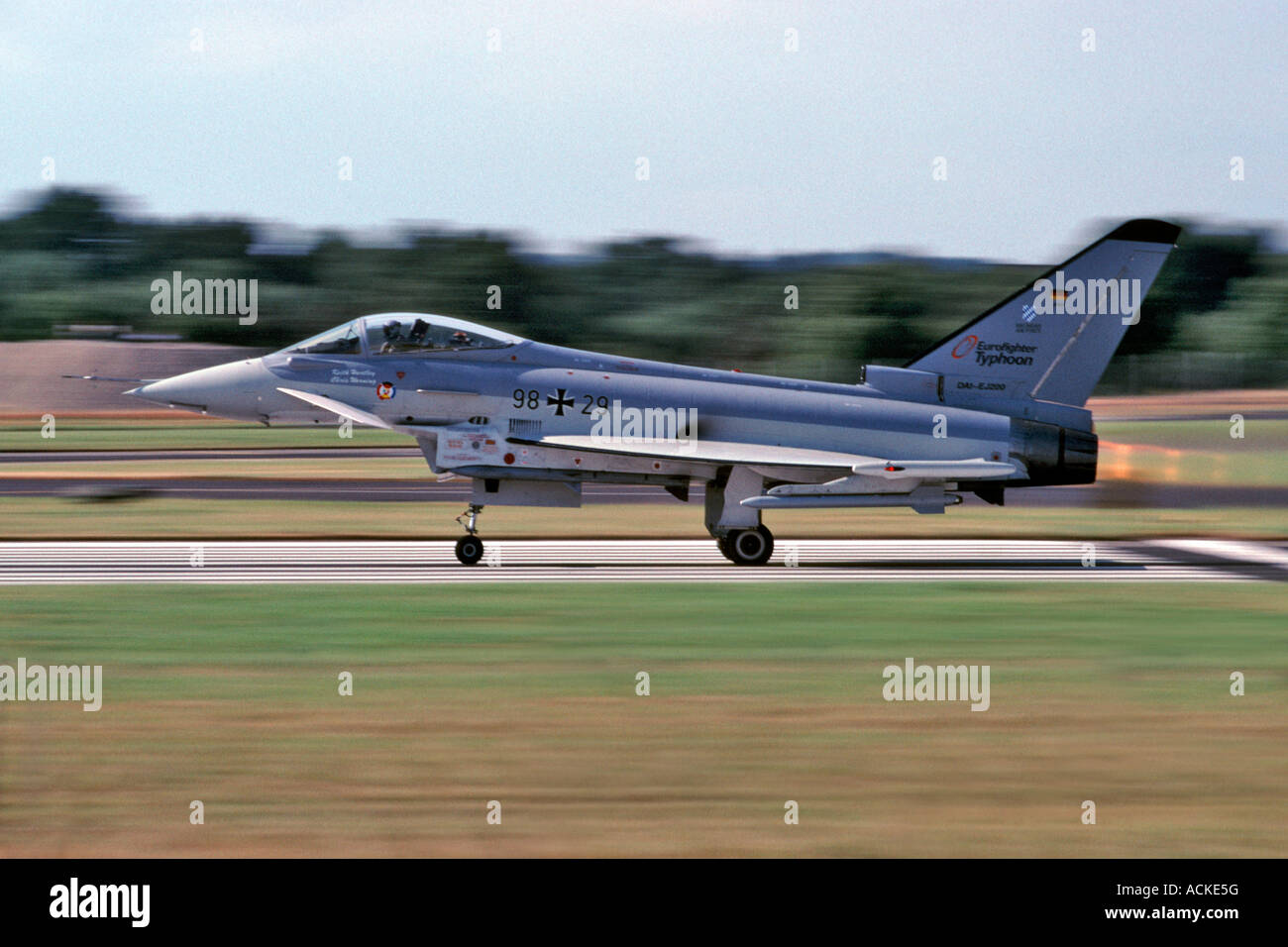 A Eurofighter Typhoon fighter jet taking off at the Farnborough airshow ...