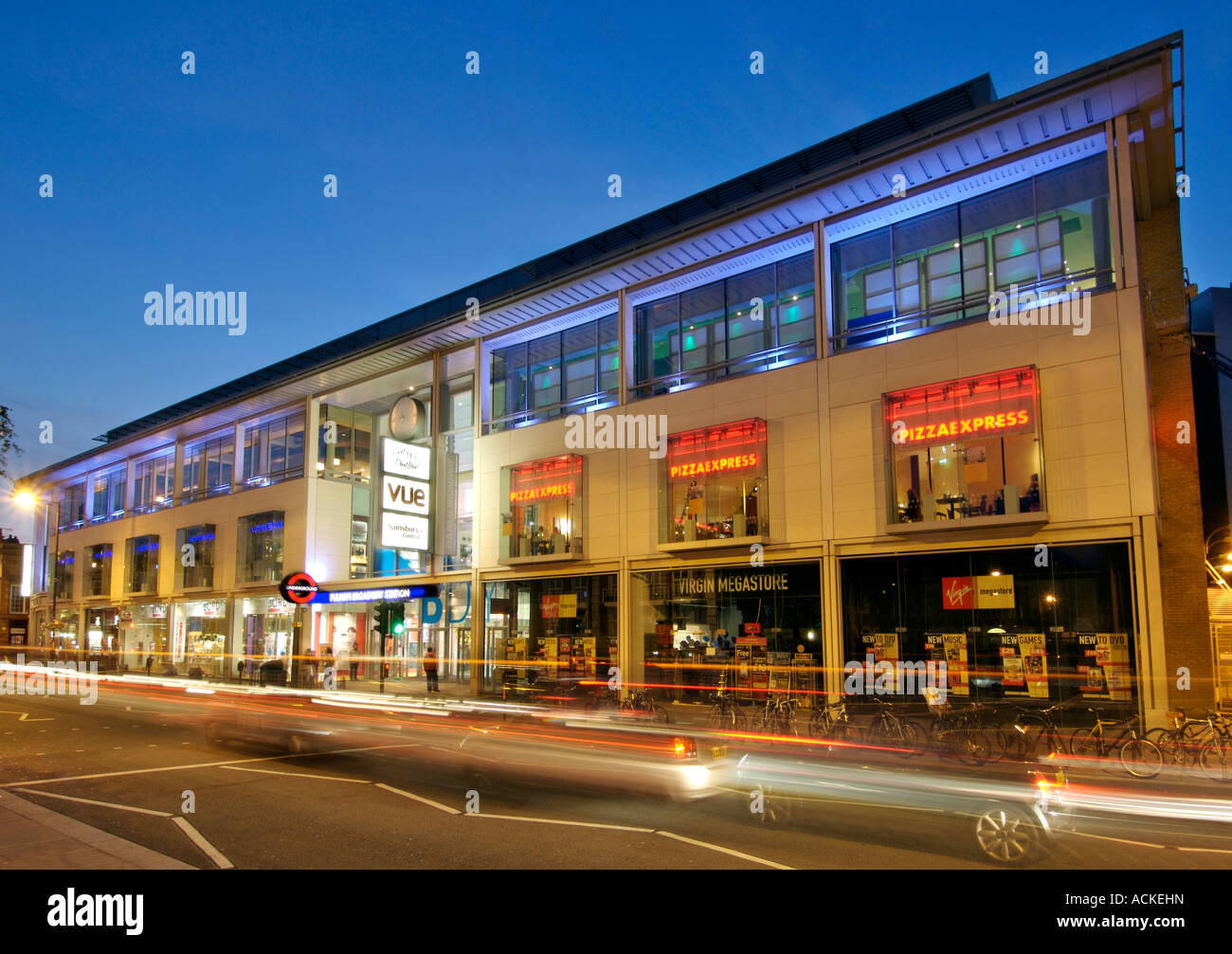 Dusk view of the Fulham Broadway shopping centre on Fulham road in ...