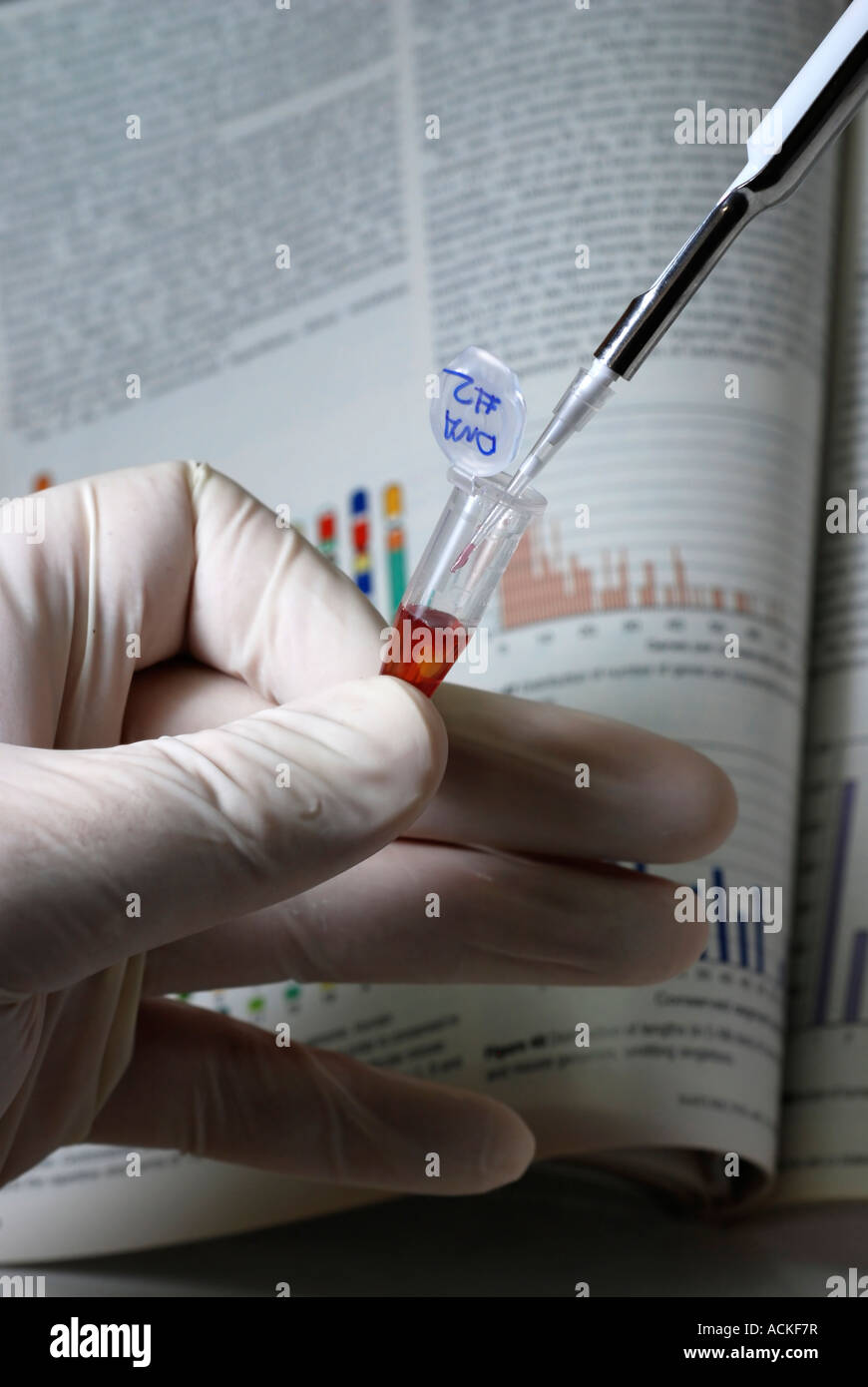 DNA research with graphics charts reference in the background Stock ...