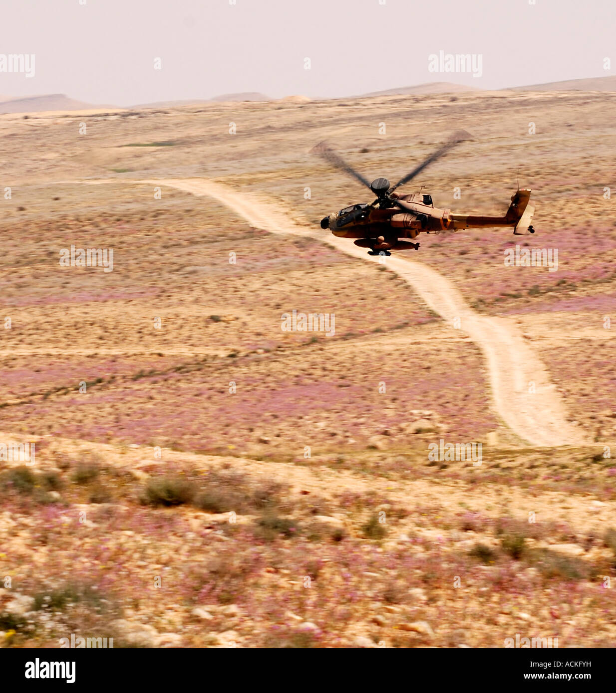 Israel Negev Israeli military helicopter flying over the Negev desert ...